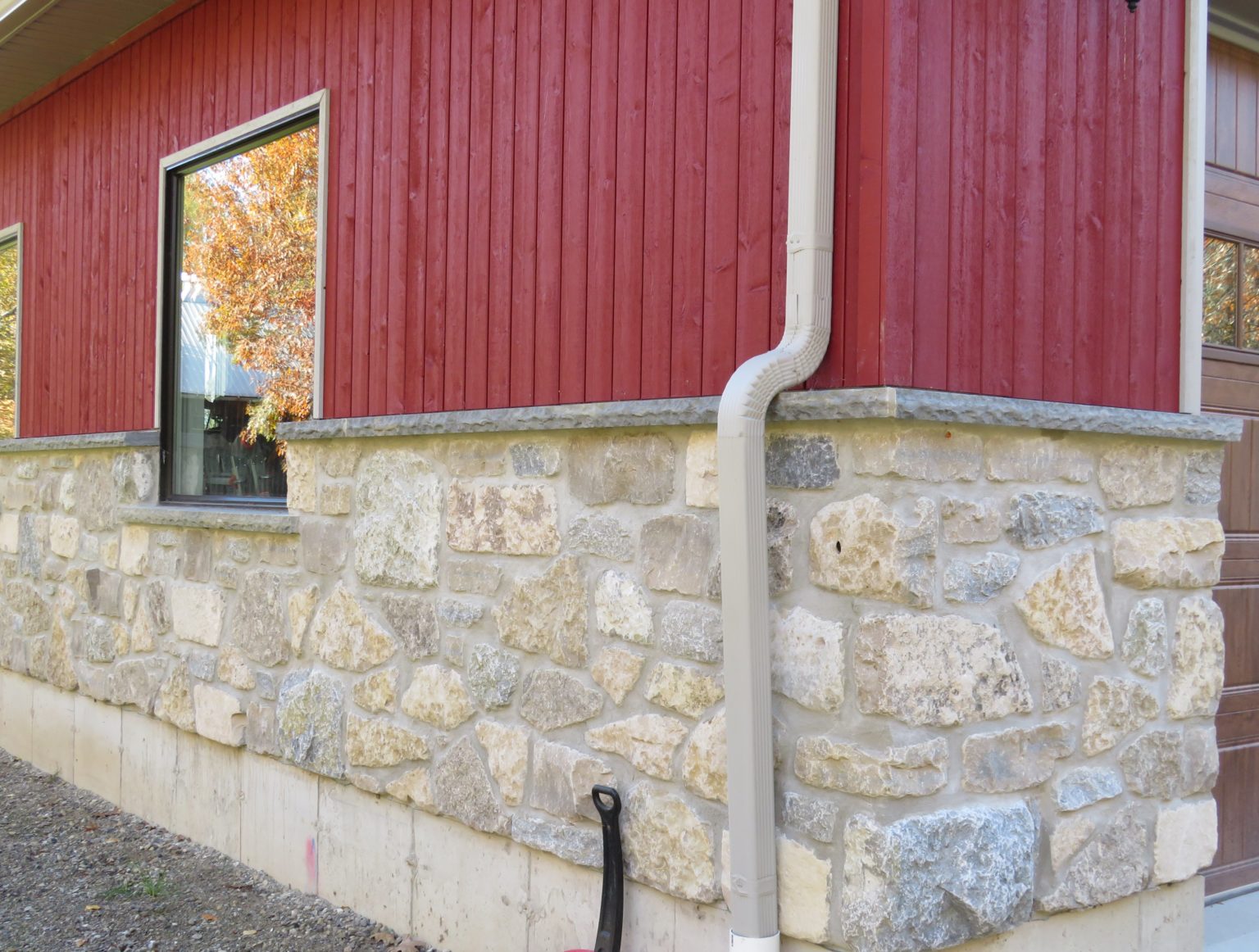 Red Lake House with Chateau Real Thin Stone Veneer Exterior | Quarry Mill