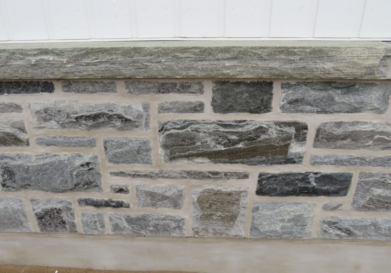 Pembroke Granite Thin Veneer Exterior with Light Mortar Flush Joint ...
